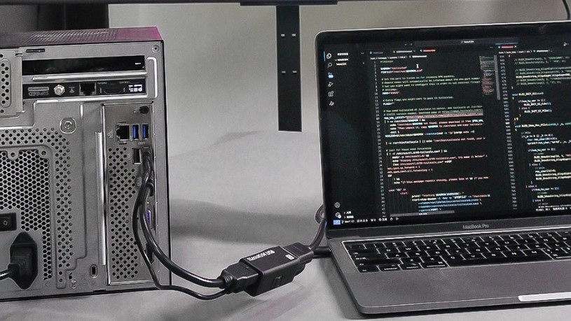 Compact KVM: Remote control, 4K HDMI, USB.